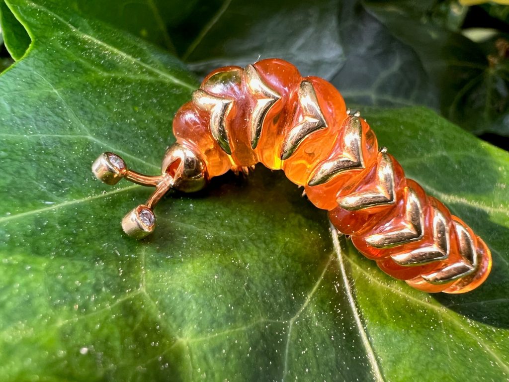 A Fancy Fat Caterpillar - Pook & Pook Inc.